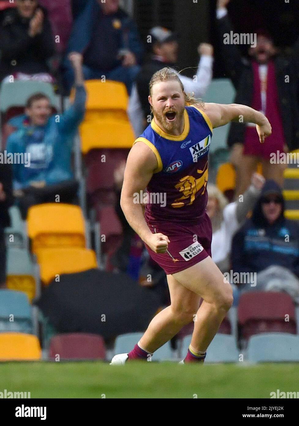 Daniel Rich of the Lions celebrates kicking a goal during the Round 4 ...