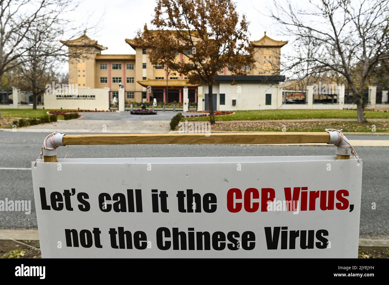 A sign reading ' Let's call it the CCP Virus, not the Chinese Virus' is ...