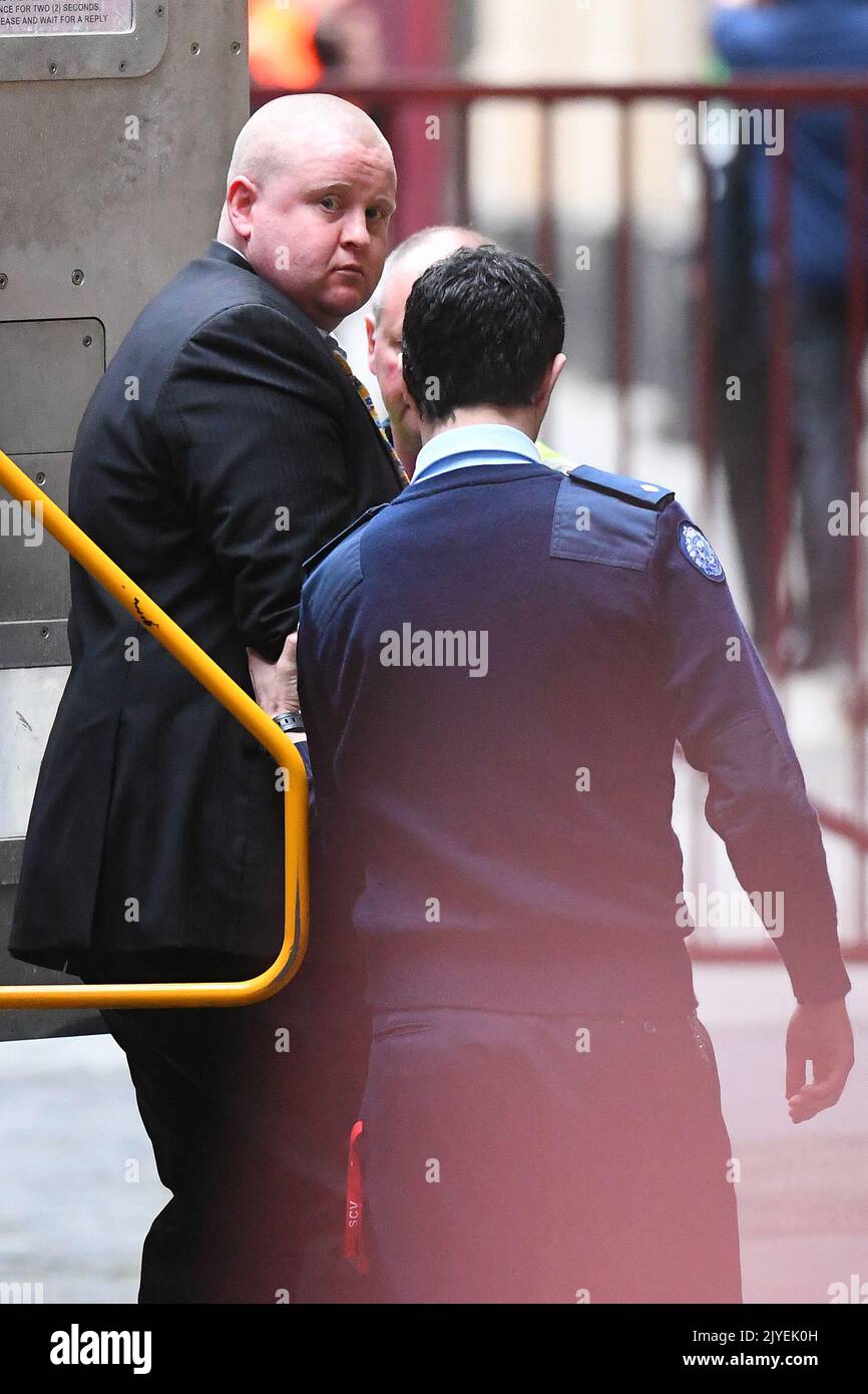 Daniel Treasure (left) arrives at the Supreme Court of Victoria in ...