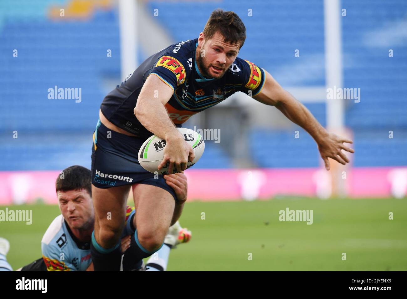 Anthony Don of the Titans scores a try during the Round 8 NRL match ...