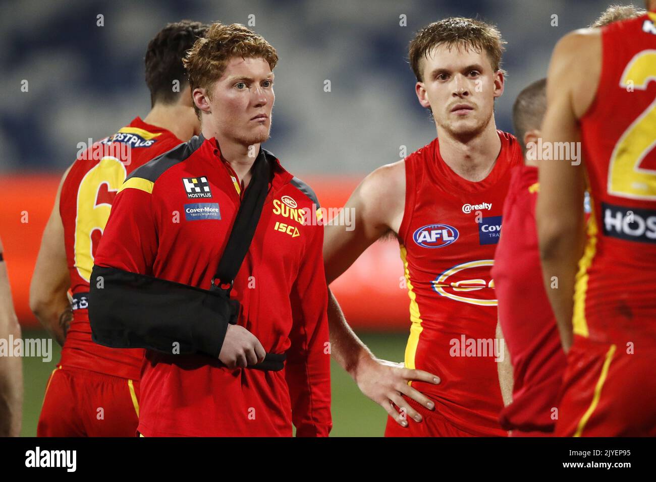 Matthew Rowell of the Suns is seen injured with Noah Anderson of the ...