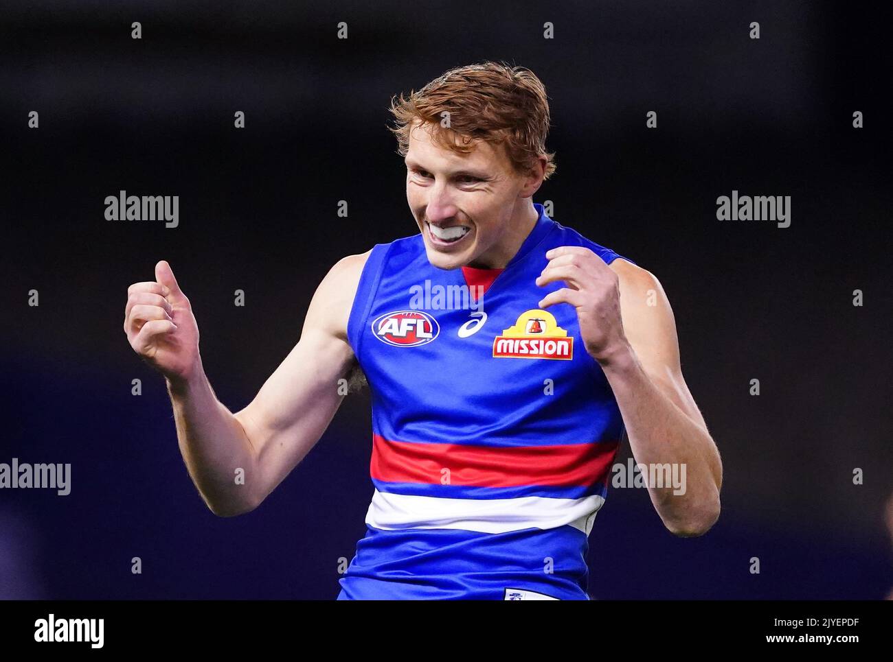 Bailey Dale of the Bulldogs celebrates after kicking a goal during the ...