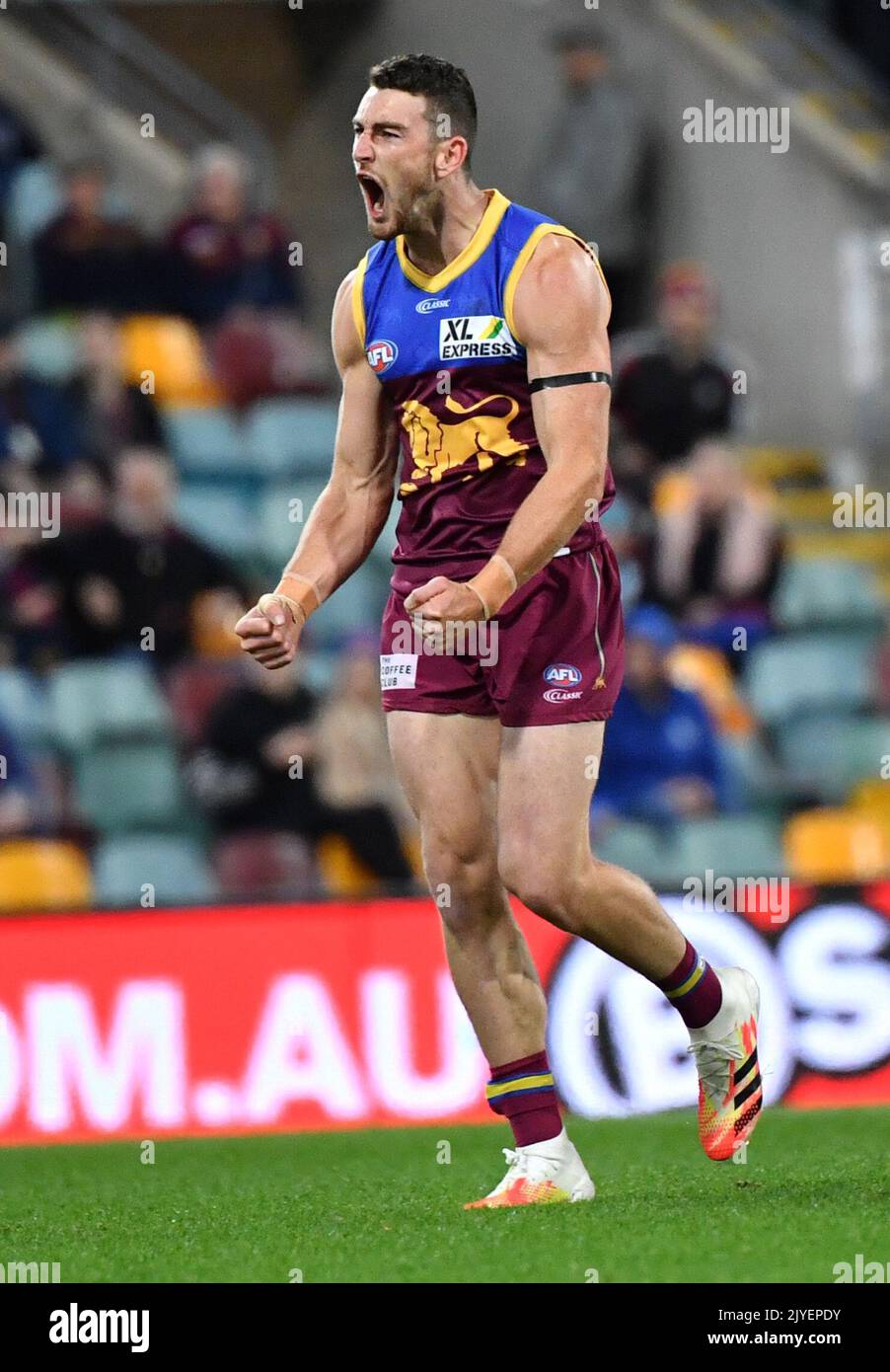 Daniel McStay of the Lions celebrates kicking a goal during the Round 5 ...
