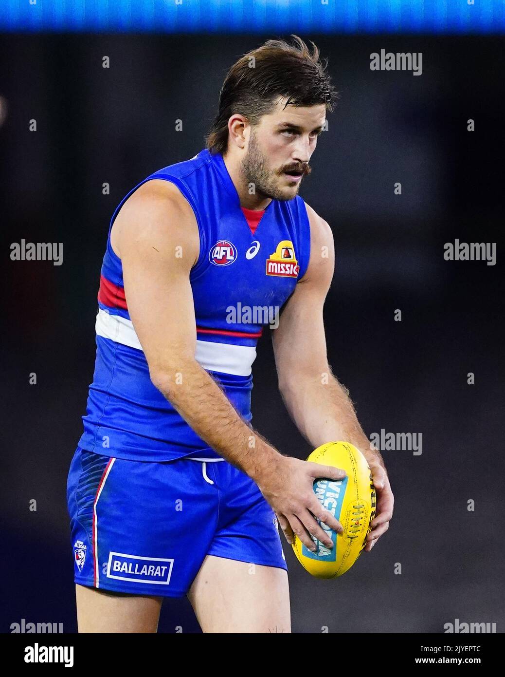 Josh Bruce of the Bulldogs kicks a goal during the Round 5 AFL match ...