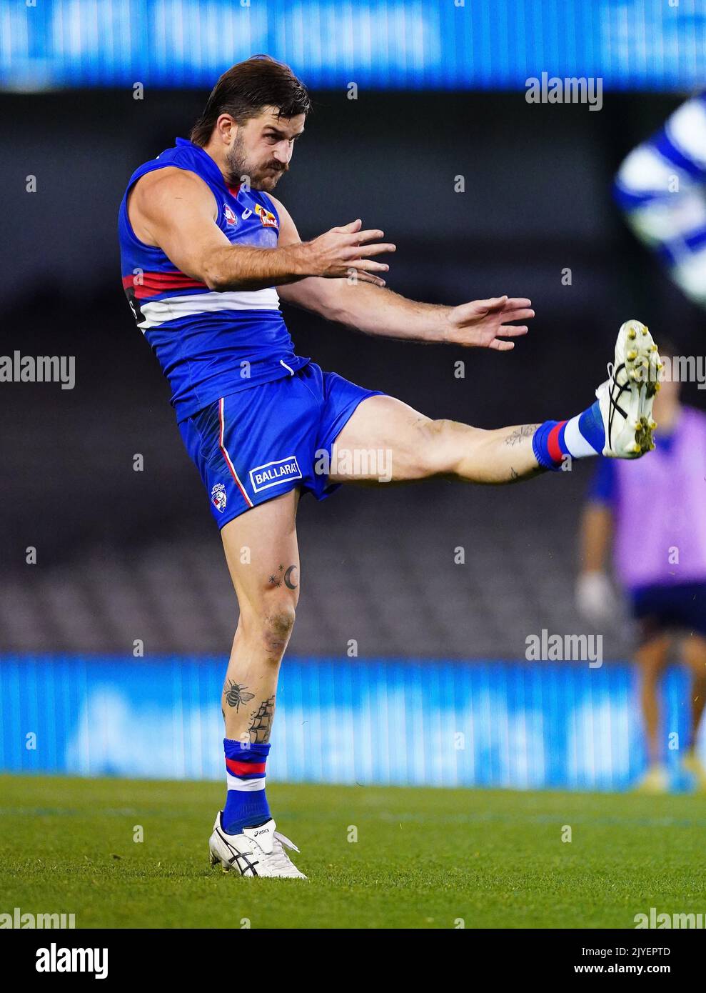 Josh Bruce of the Bulldogs kicks a goal during the Round 5 AFL match ...