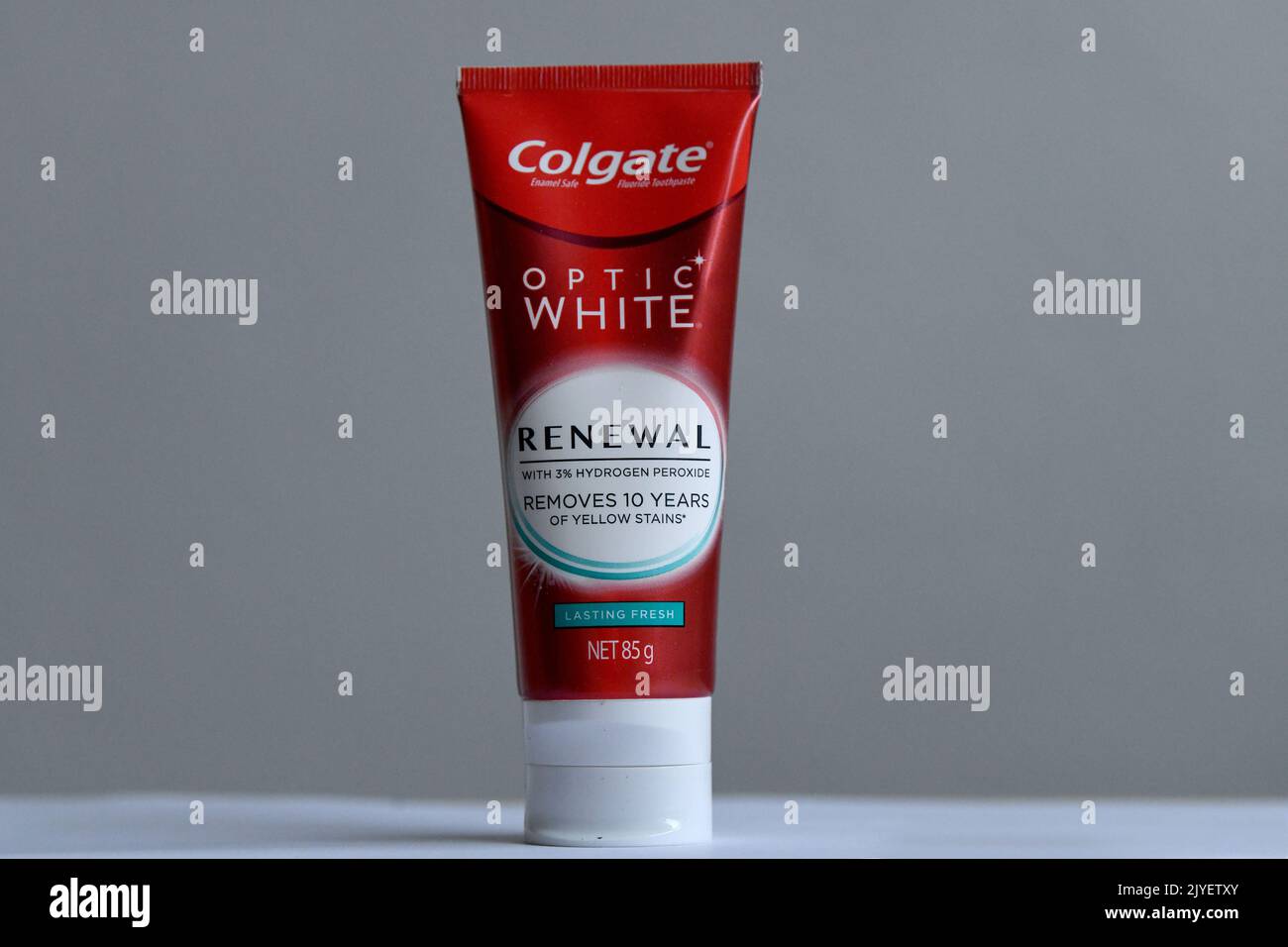 A tube of Colgate Optic White Renewal toothpaste is photographed in ...