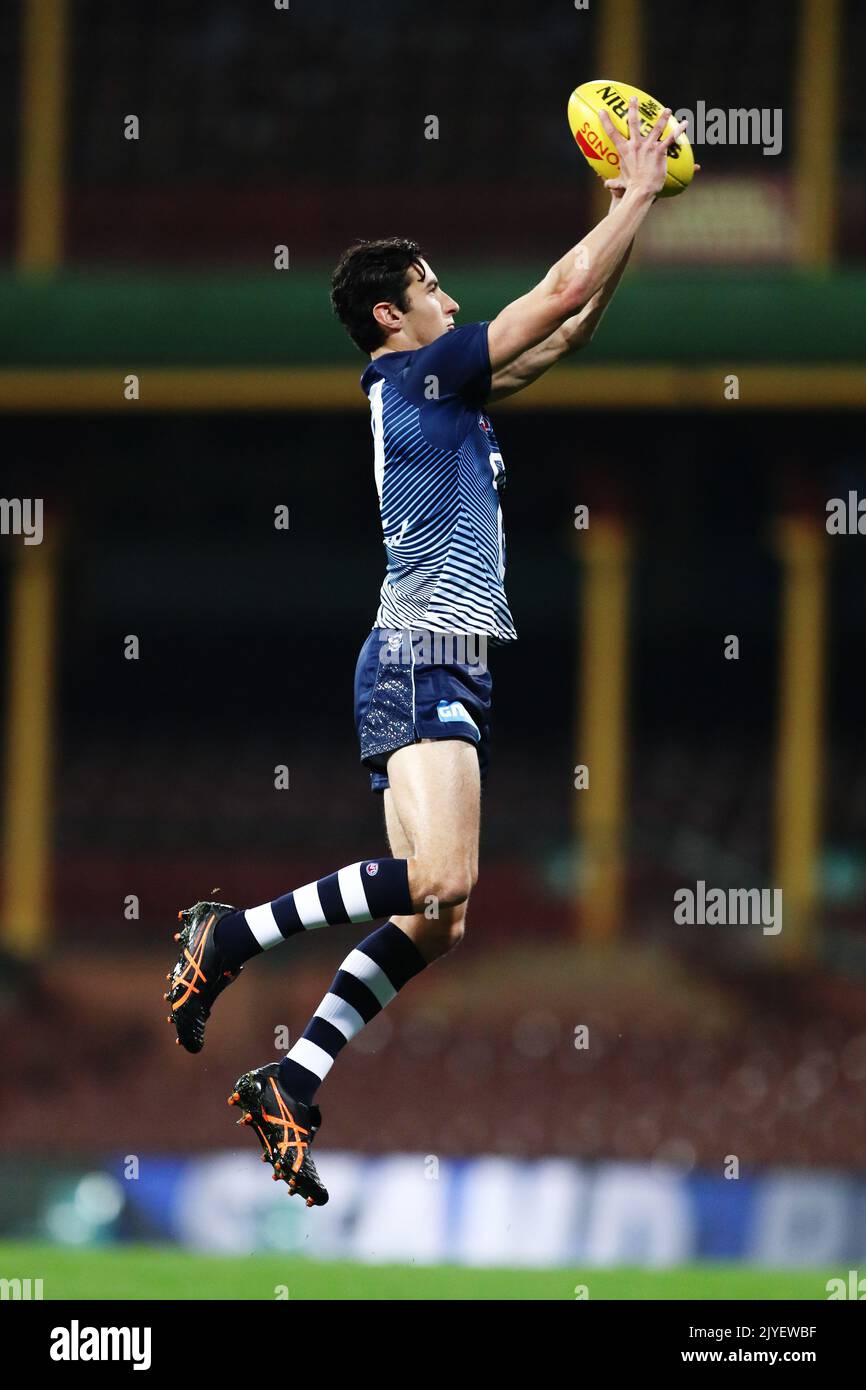 Sam Simpson of the Cats warms up ahead of the Round 6 AFL match between ...