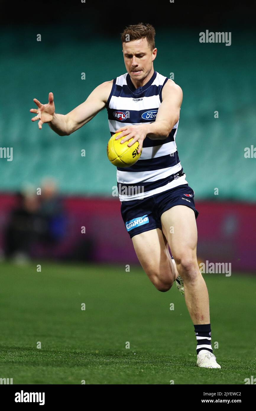 Mitch Duncan of the Cats kicks during the Round 6 AFL match between ...