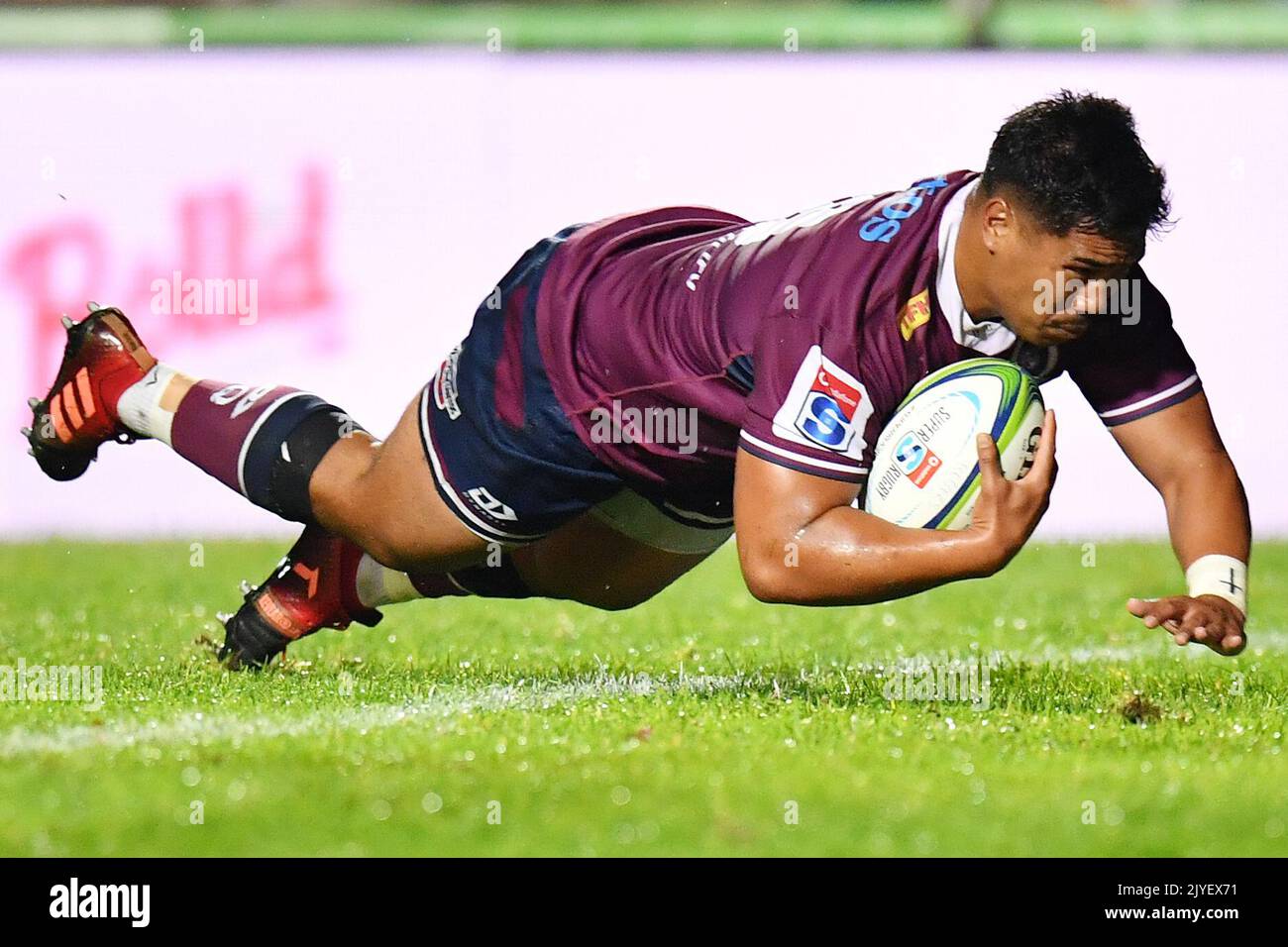 Alex Mafi of the Reds scores a try during the Round 2 Super Rugby match ...