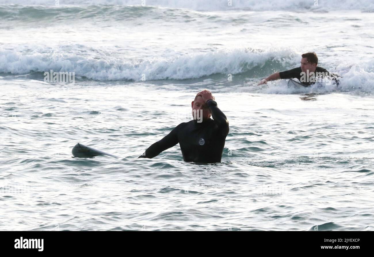 Mick Fanning reacts during a 'Paddle Out For Chumpy' in memory of ...