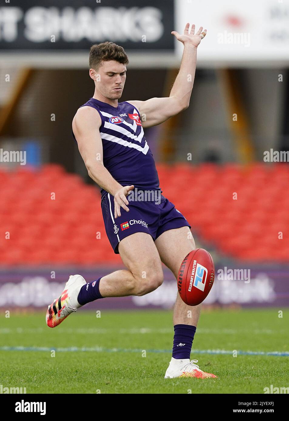 Blake Acres of the Dockers warms up during the Round 6 AFL match ...
