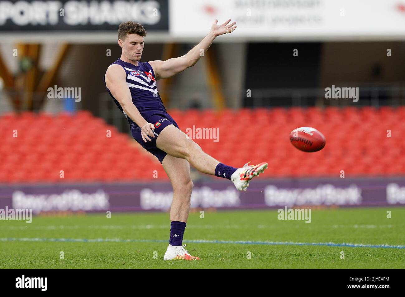 Blake Acres of the Dockers warms up during the Round 6 AFL match ...