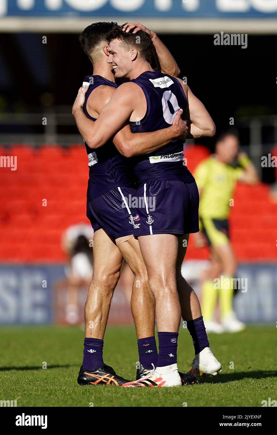 Ethan Hughes (left) and Blake Acres of the Dockers celebrate following ...