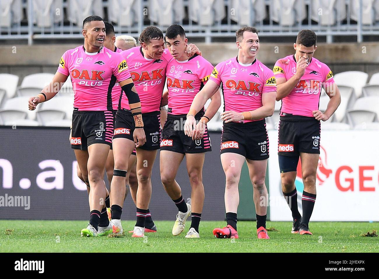 Charlie Staines of the Panthers (centre) celebrates with teammates ...