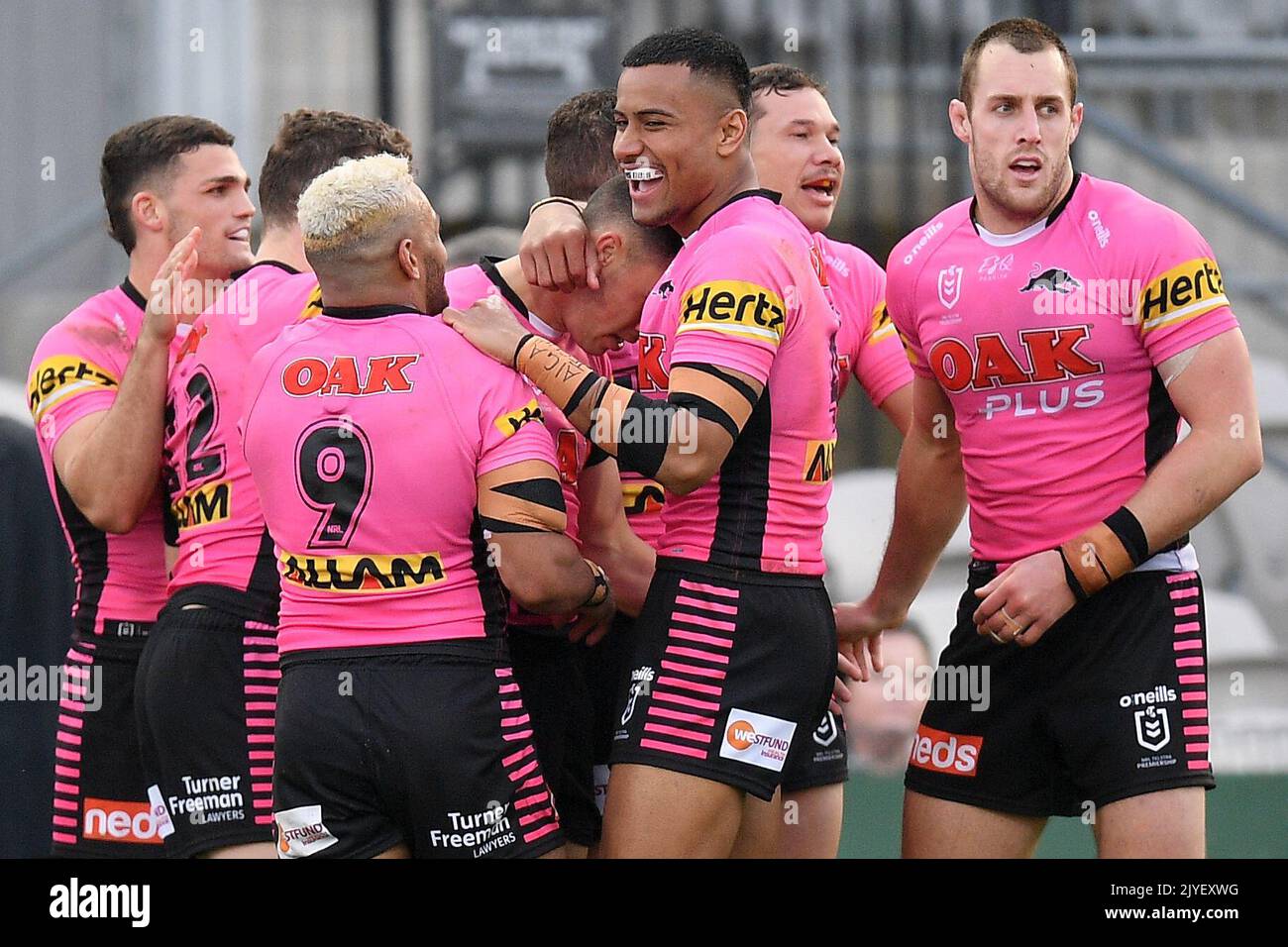 Charlie Staines of the Panthers (centre) celebrates with teammates ...