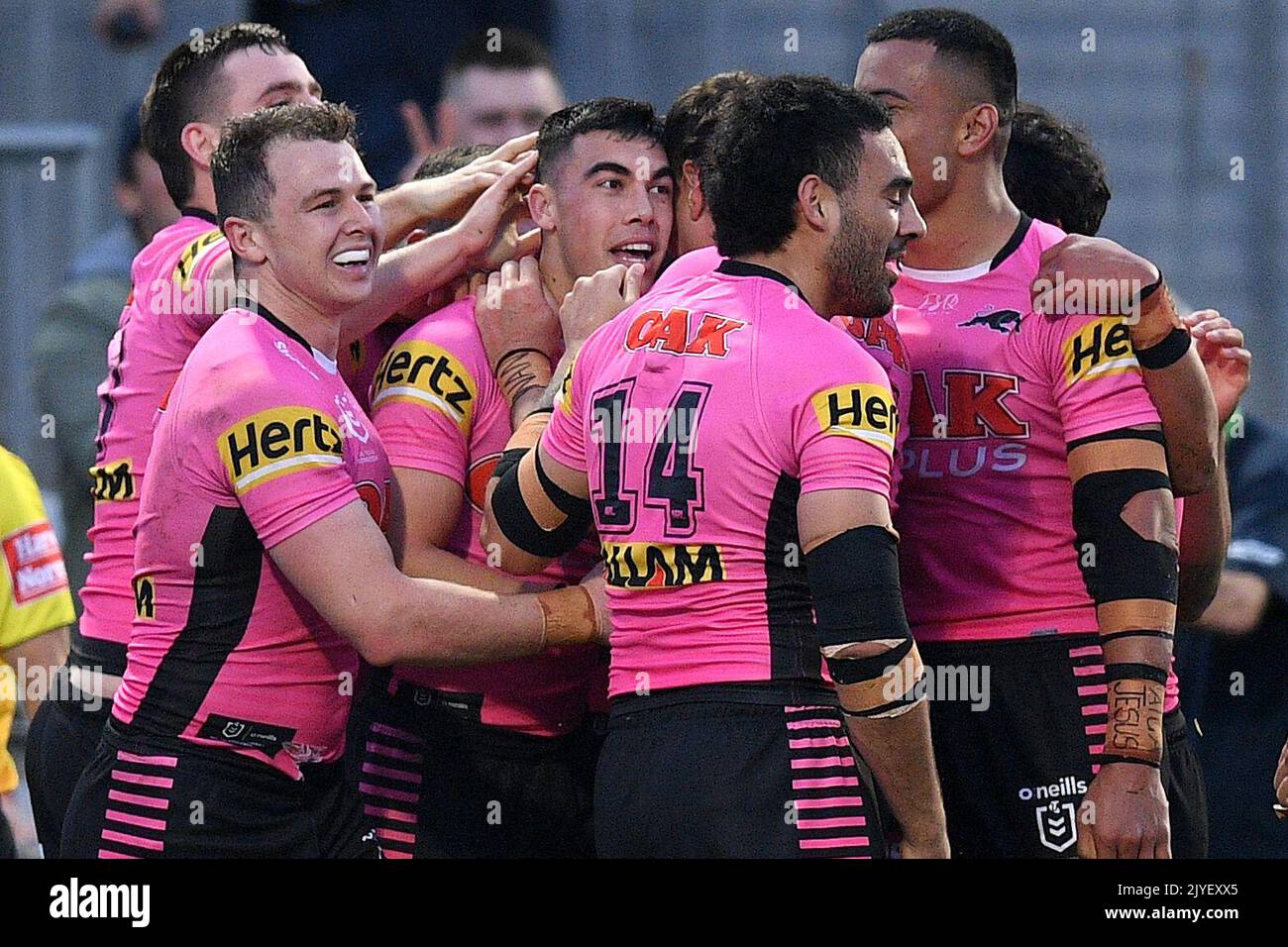 Charlie Staines of the Panthers (centre) celebrates with teammates ...