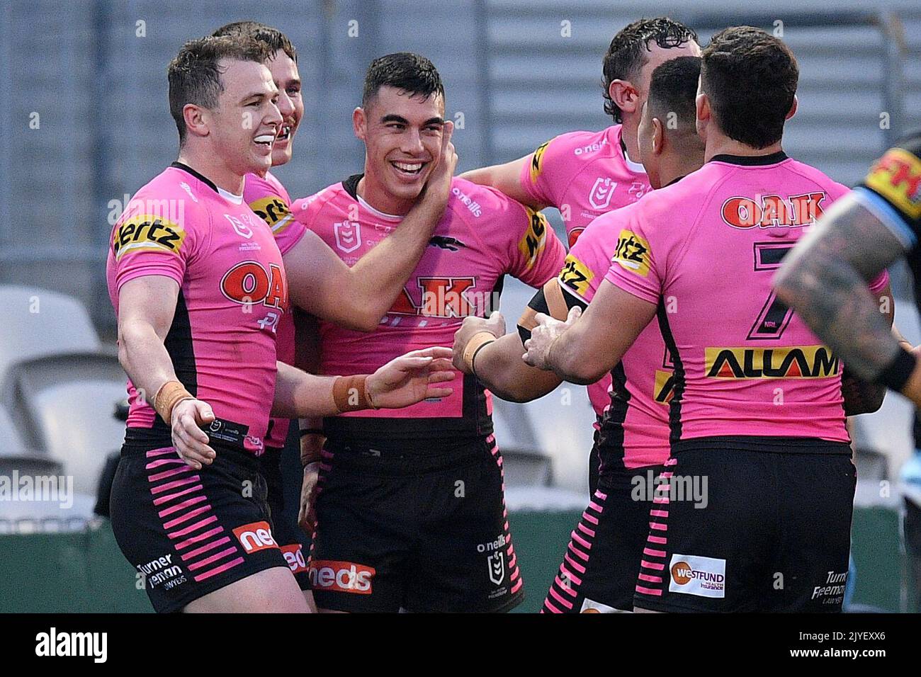 Charlie Staines of the Panthers (centre) celebrates with teammates ...