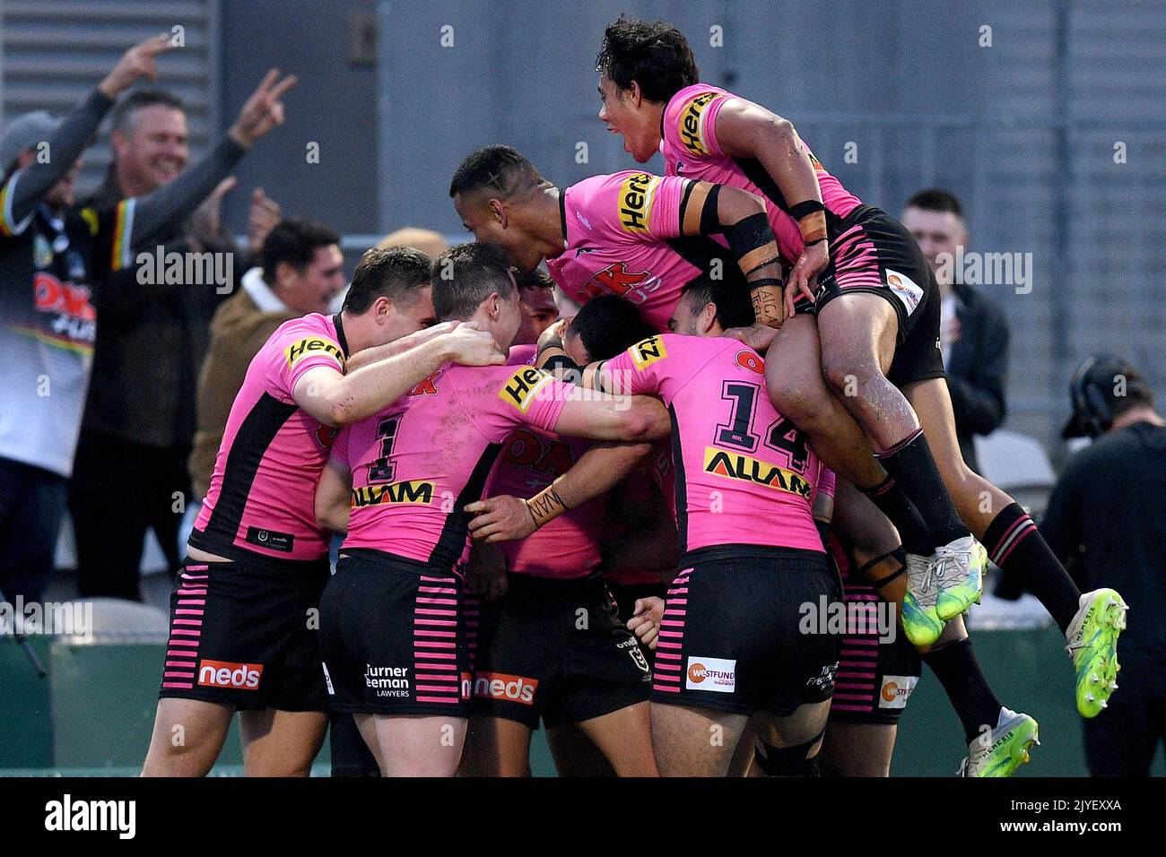 Charlie Staines of the Panthers (centre) celebrates with teammates ...