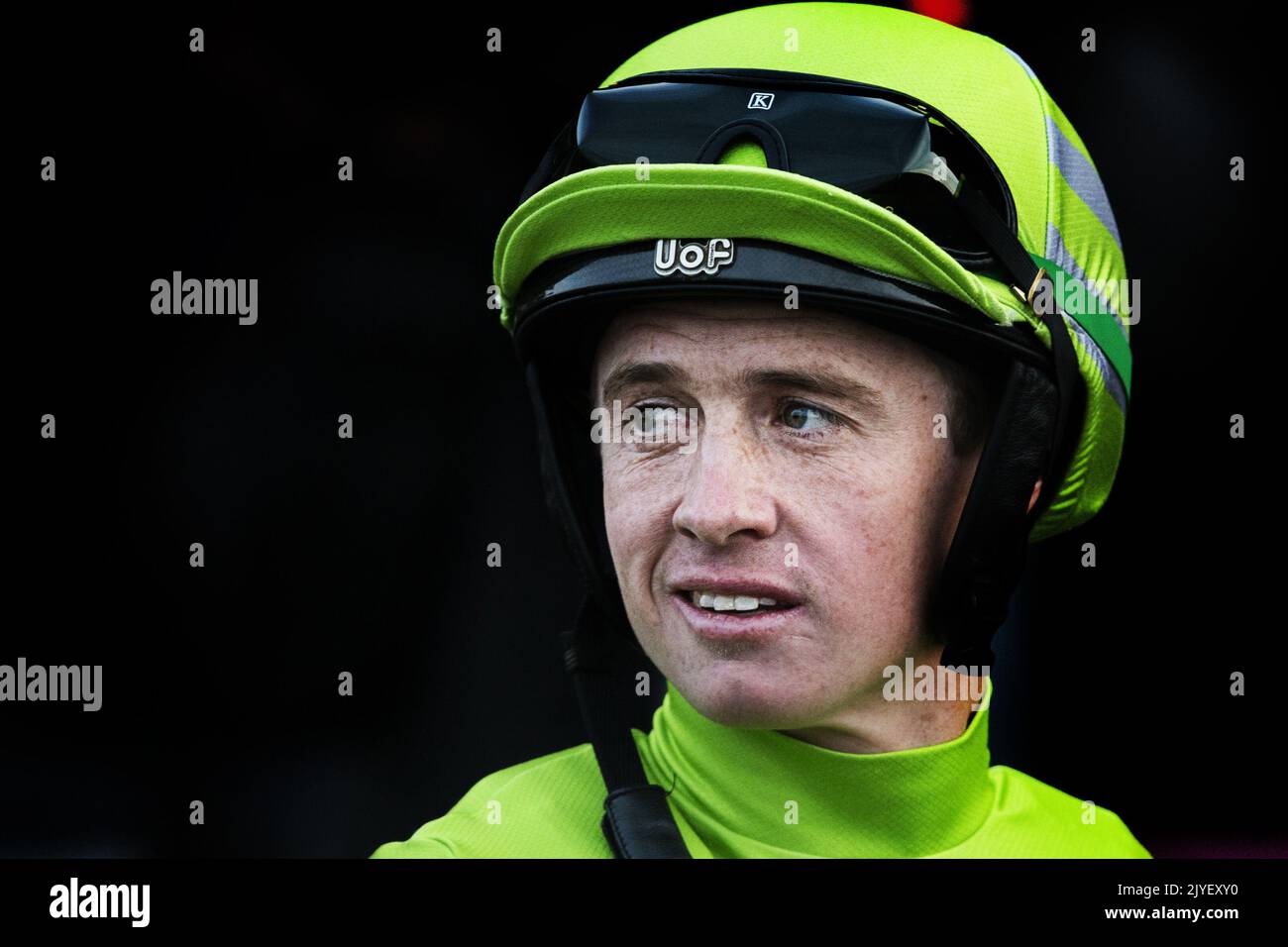 Jockey Brock Ryan looks on after riding Partners to victory in race 9 ...