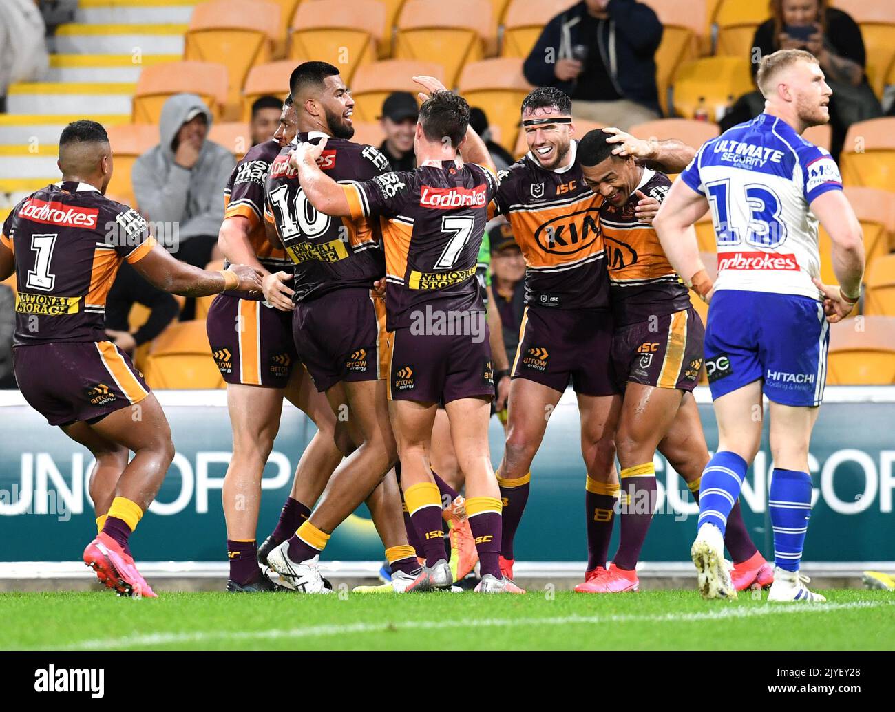 Broncos players celebrate a try during the Round 9 NRL match between ...