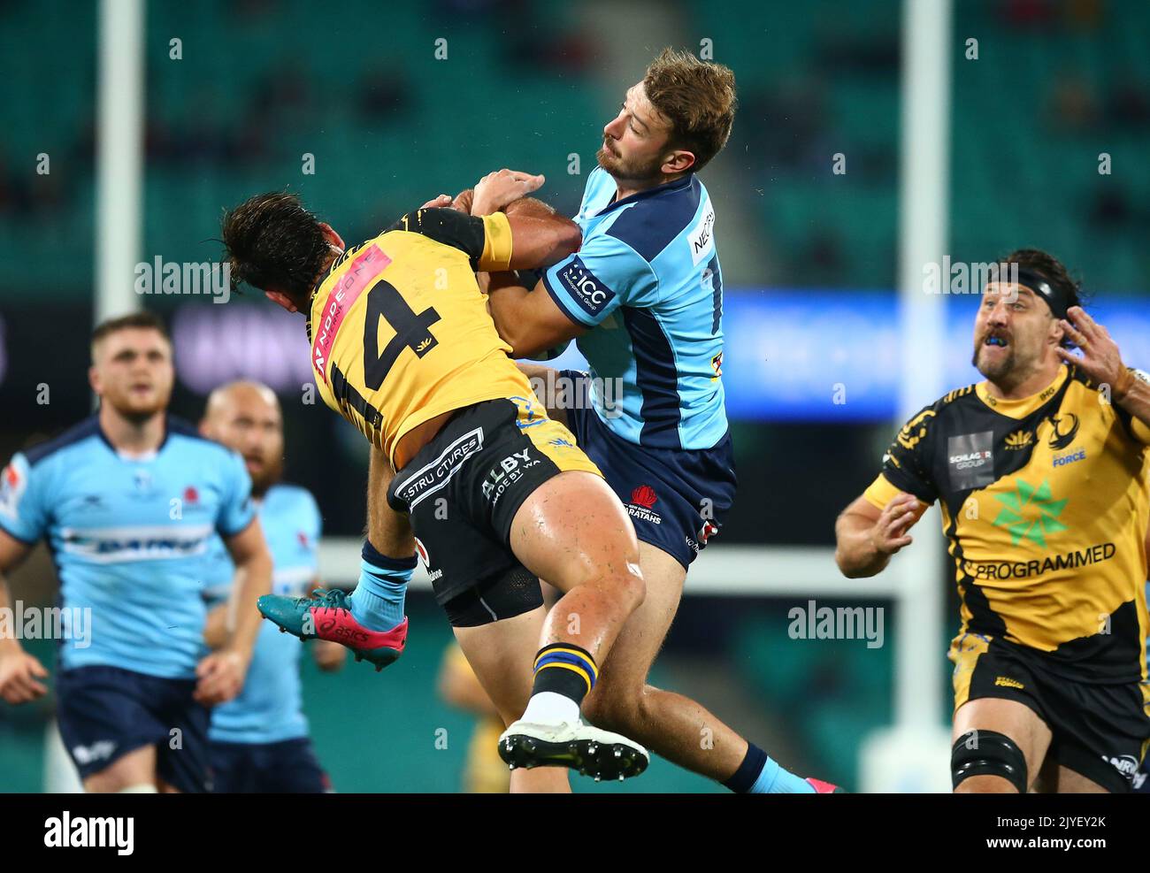 Byron Ralston of the Force and James Ramm of the Waratahs contest ...
