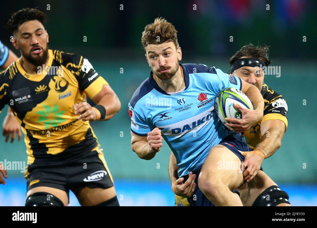 James Ramm of the Waratahs runs the ball during the Round 2 Super Rugby ...