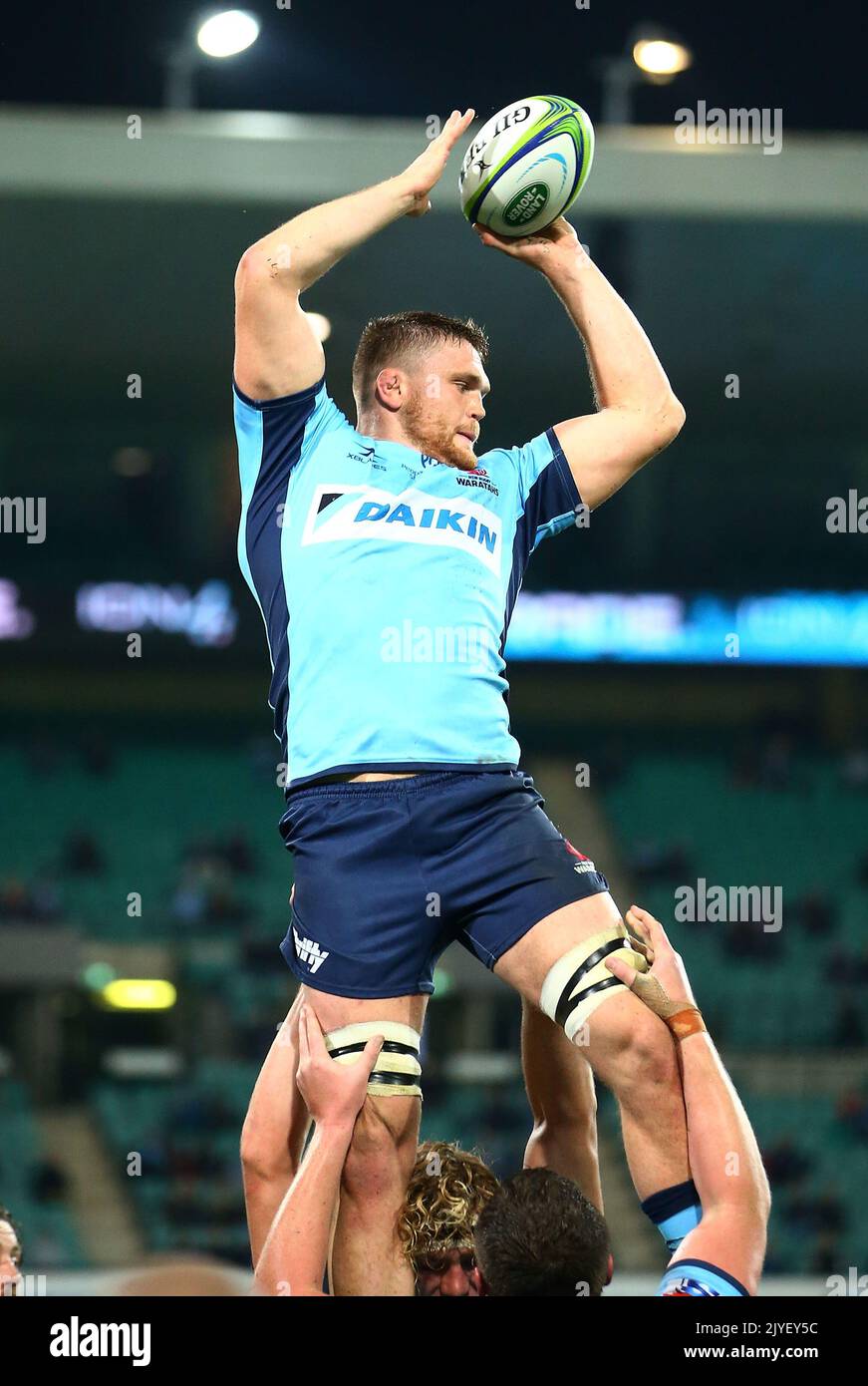Lachlan Swinton of the Waratahs wins a line out during the Round 2 ...