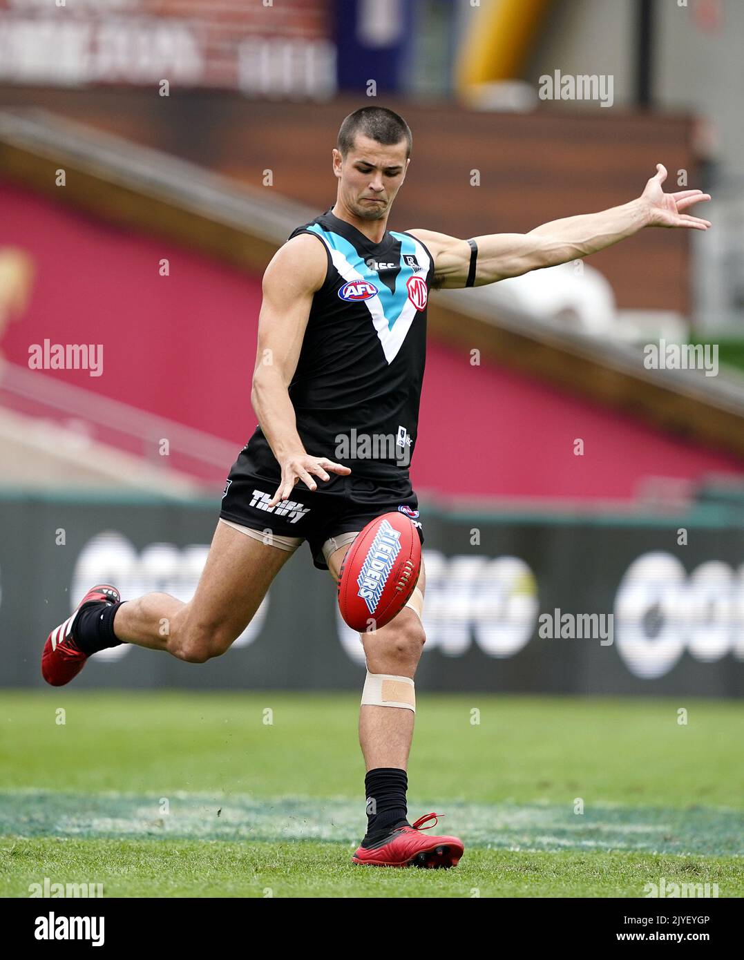 Ryan Burton of the Power warms up during the Round 6 AFL match between ...