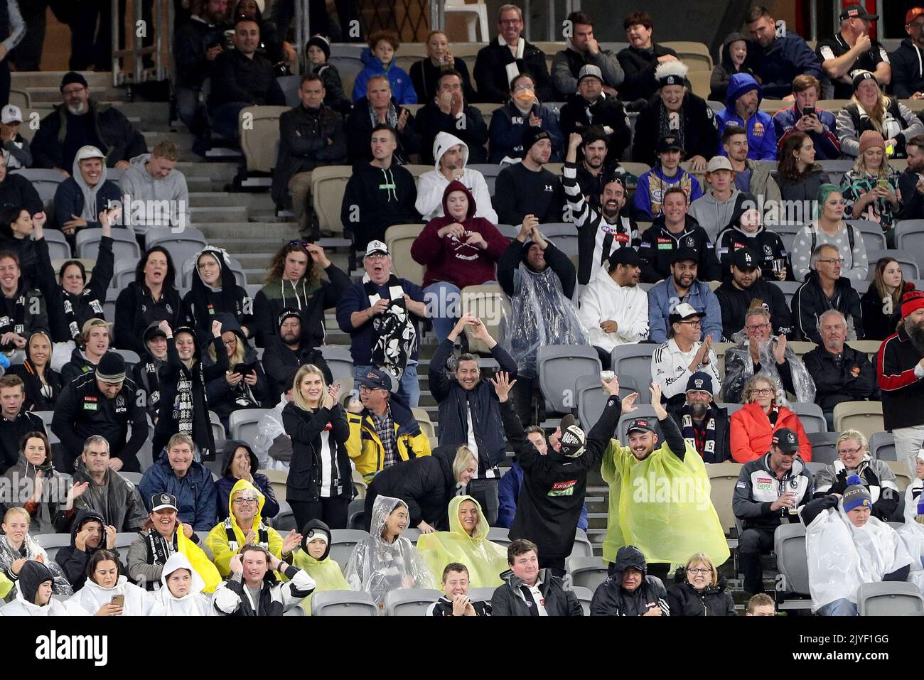 Collingwood fans cheer during the Round 7 AFL match between the Geelong ...