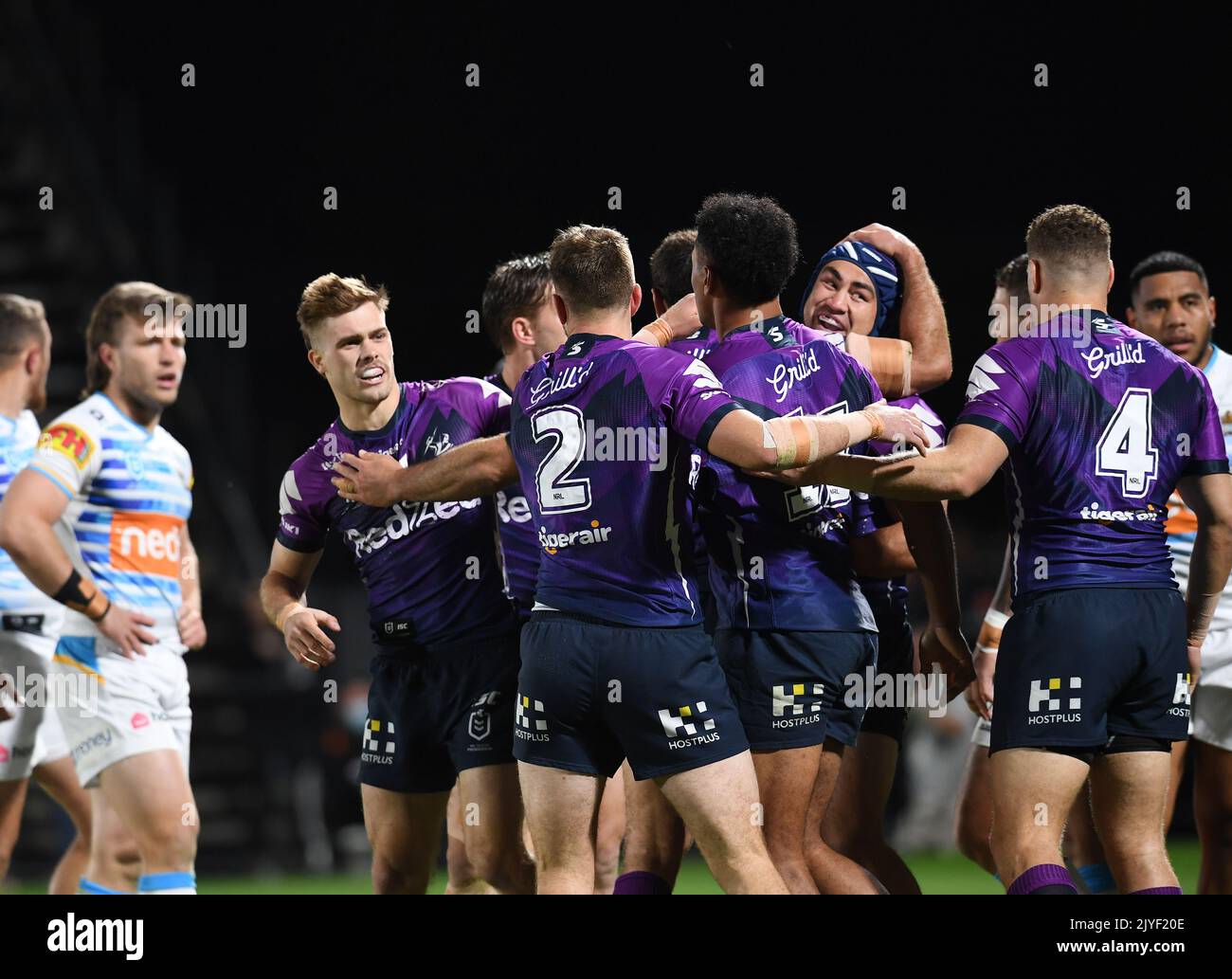 Melbourne Storm players celebrate a try during the Round 10 NRL match ...