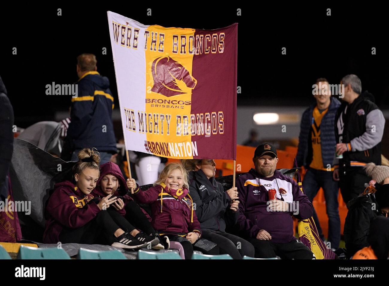 Spectators are seen in the crowd ahead of the Round 10 NRL match ...
