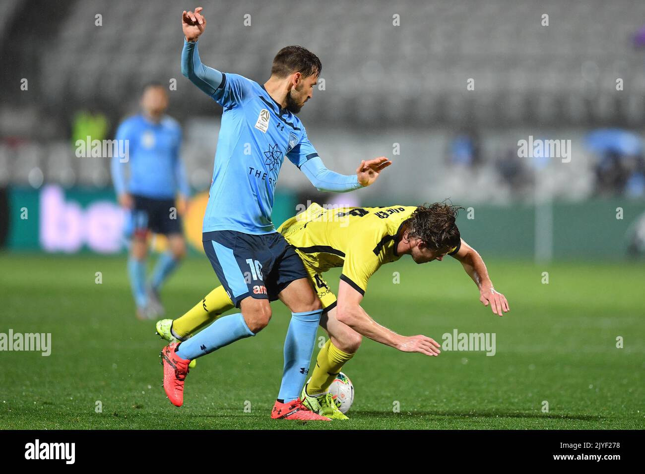 Milos Ninkovic of Sydney and Alex Rufer of the Phoenix during the A ...