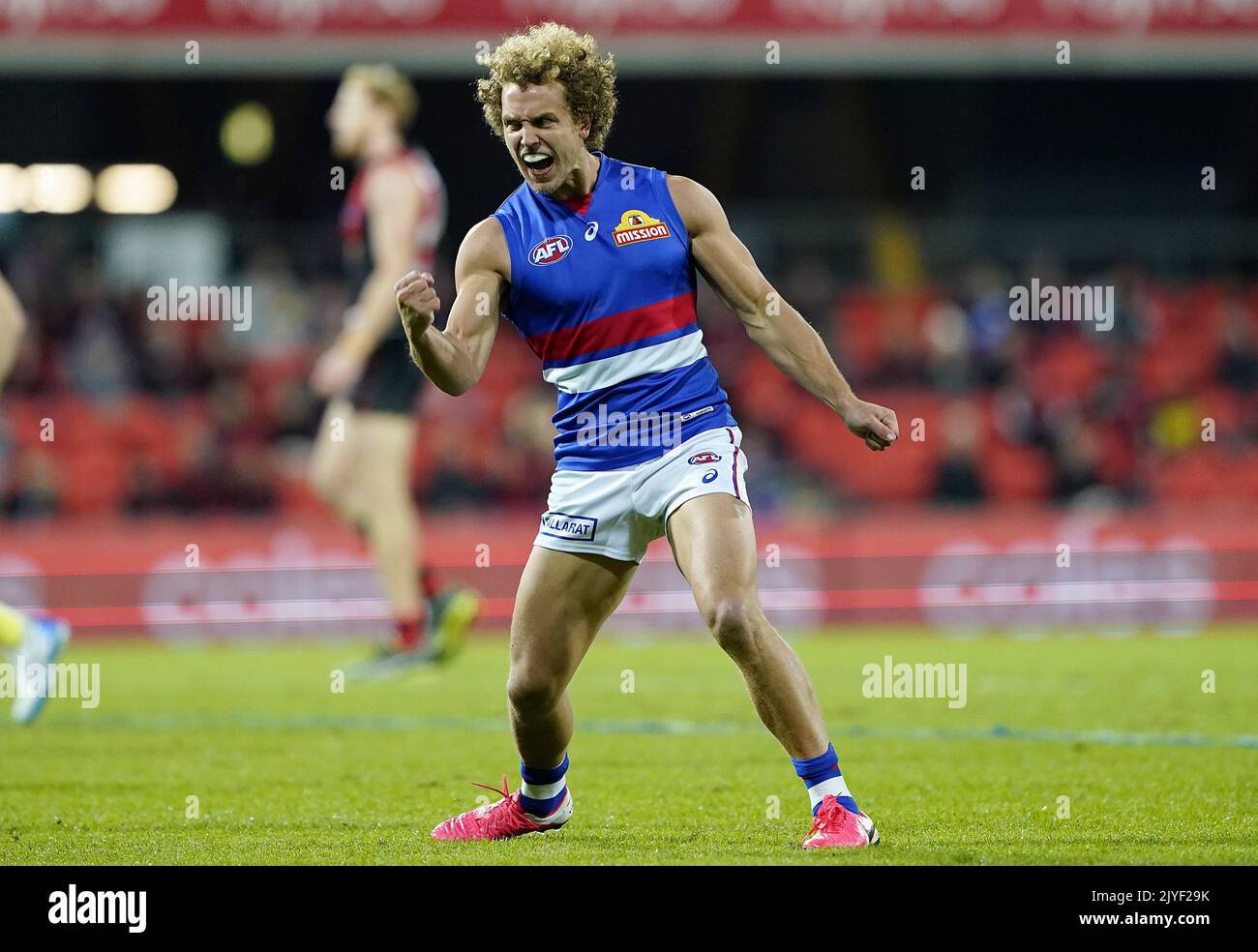 Mitch Wallis of the Bulldogs reacts after kicking a goal during the ...