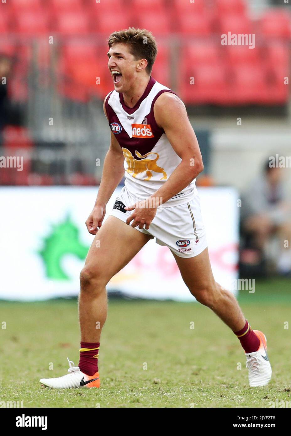 Zac Bailey of the Lions celebrates kicking a goal during the Round 7 ...
