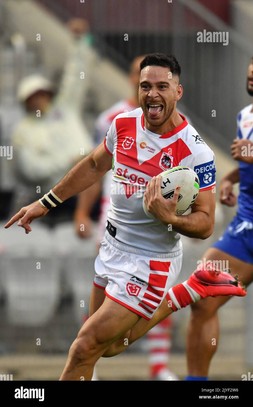 Corey Norman of the Dragons runs in to score the match winning try ...