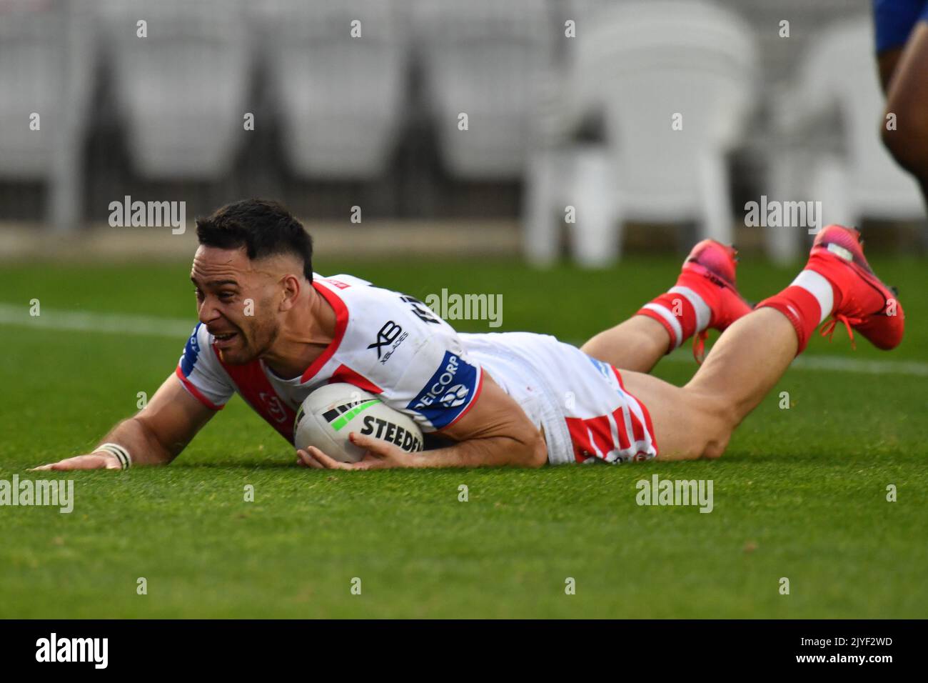 Corey Norman of the Dragons runs in to score the match winning try ...