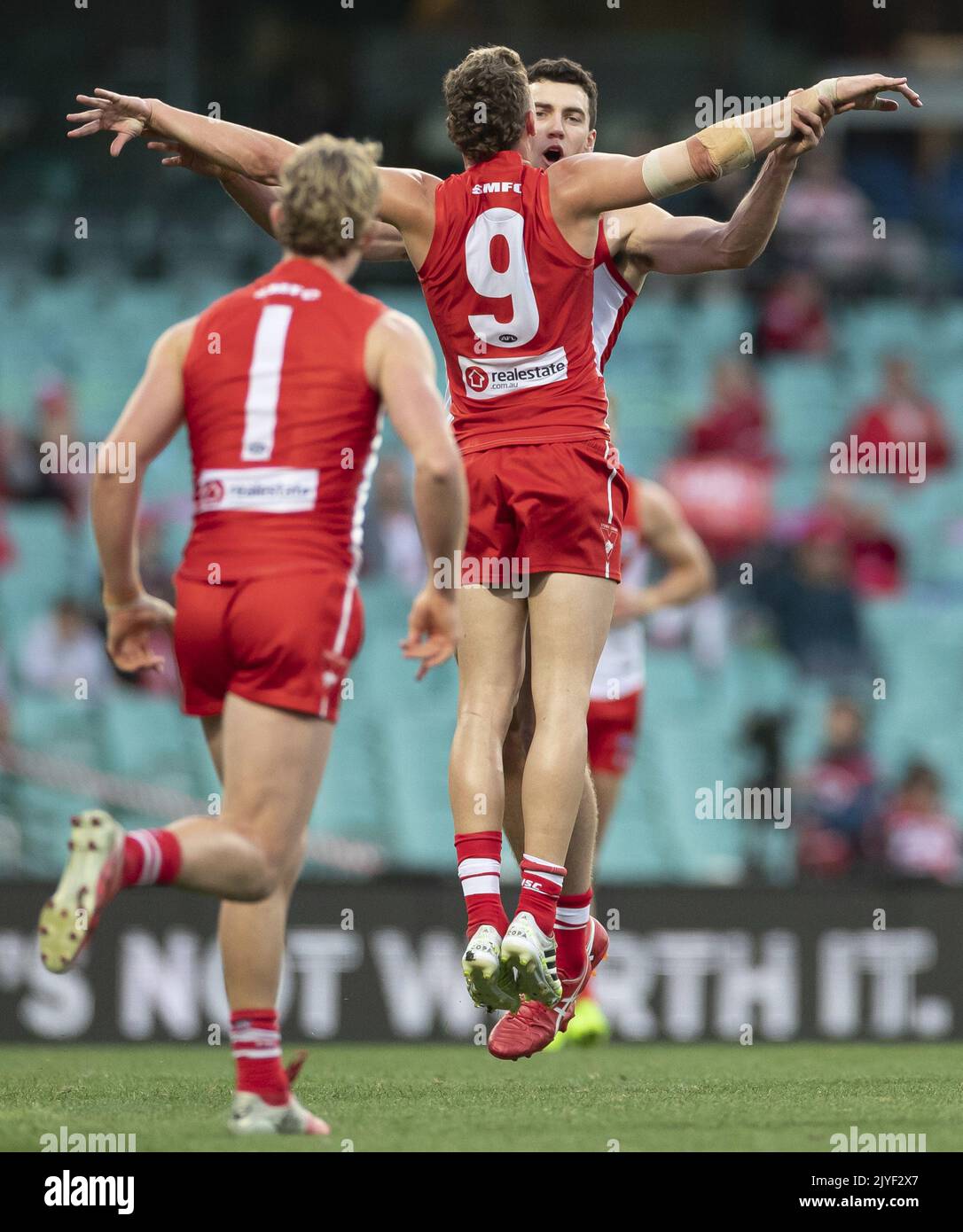 Tom McCartin of the Swans celebrates after kicking a goal during the ...
