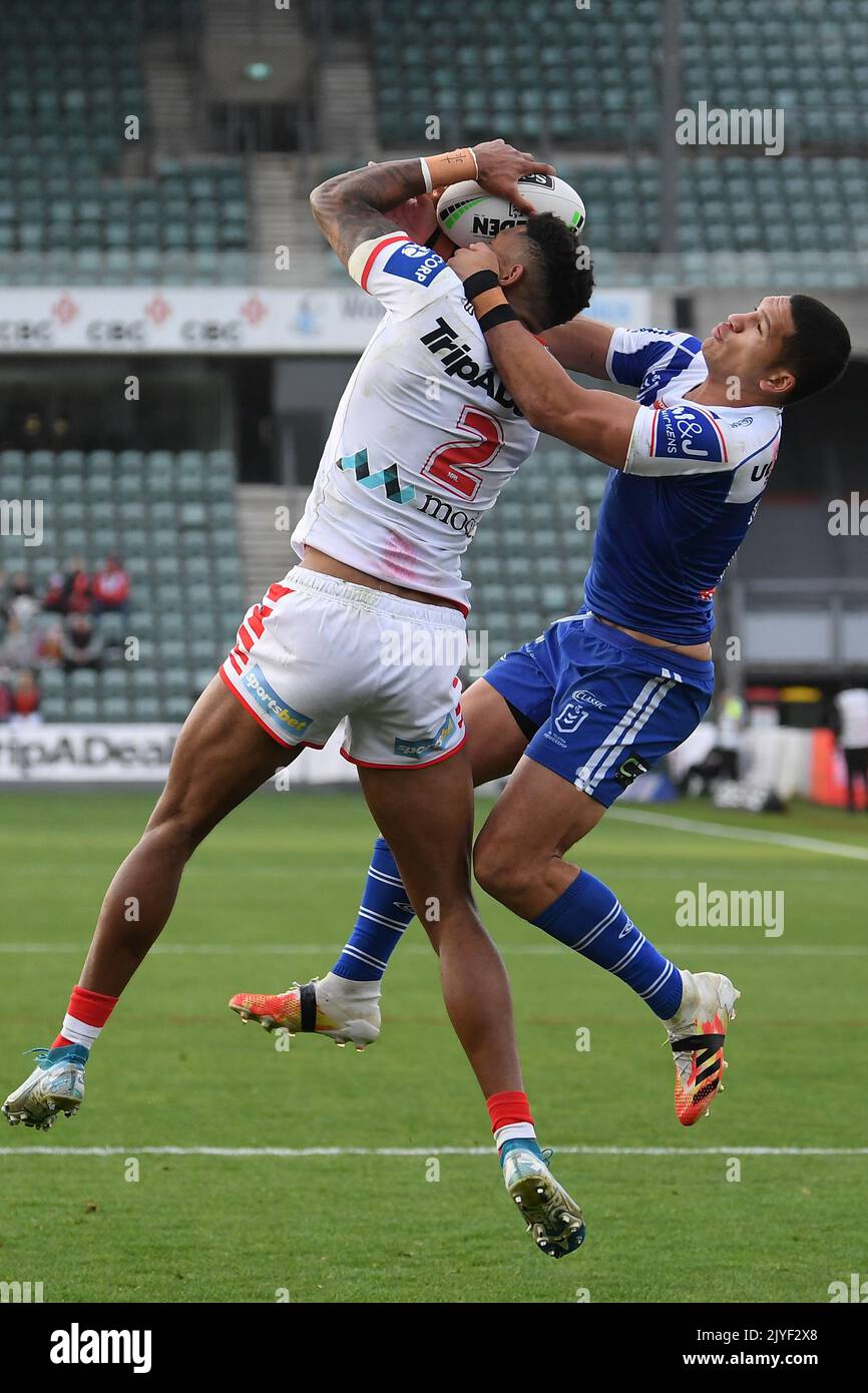 Jason Saab of the Dragons catches a high ball over Marcelo Montoya of ...