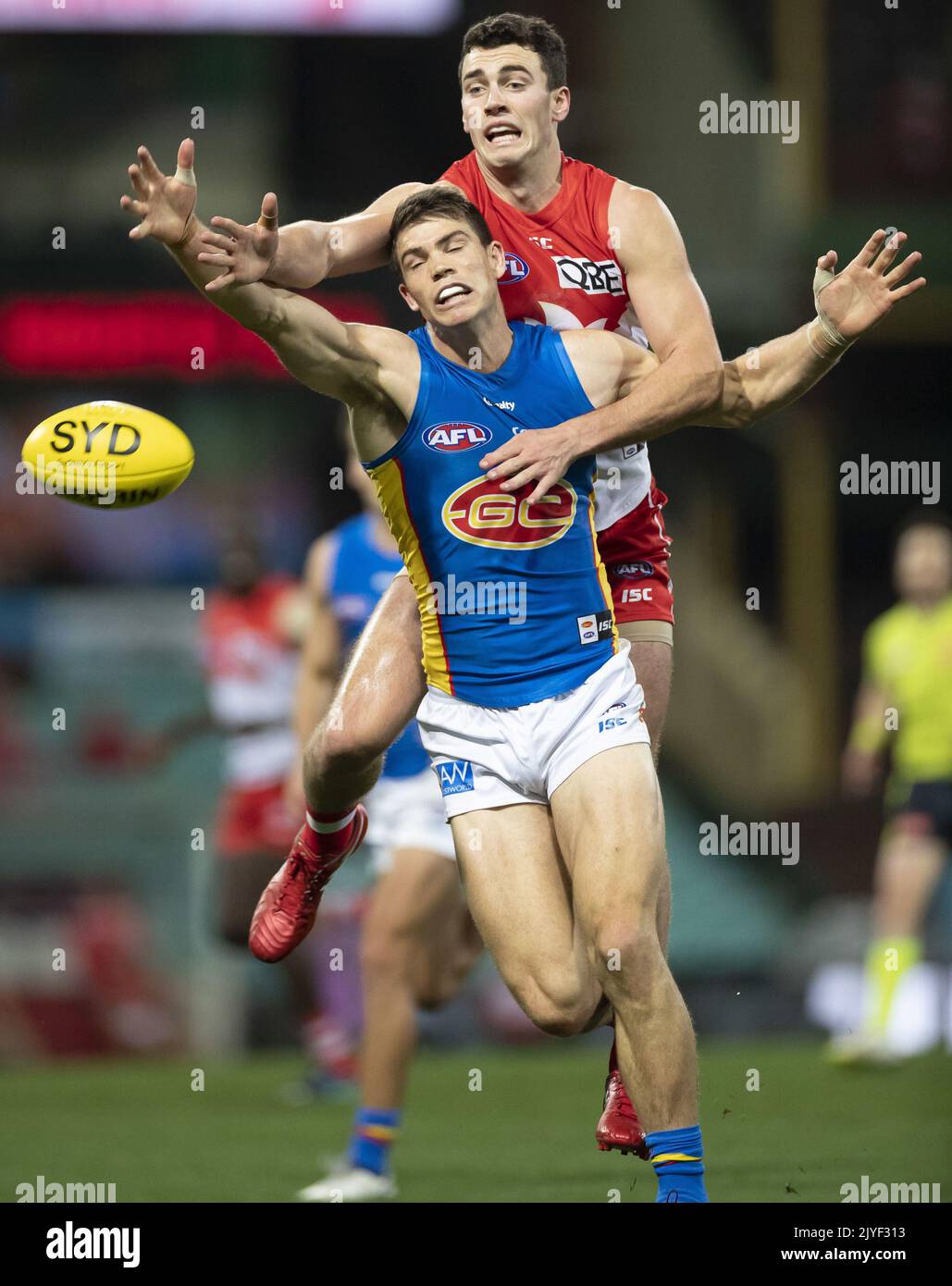 Tom McCartin of the Swans and Sam Collins of the Suns contest a mark ...