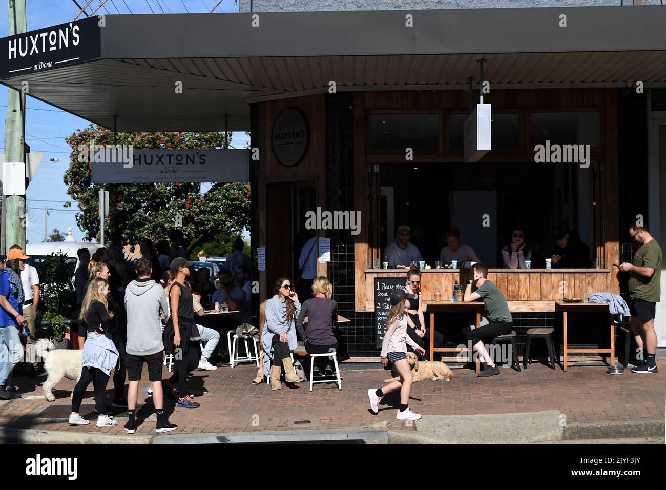 Diners are seen at a cafe in Bronte in Sydney, Sunday, July 19, 2020 ...