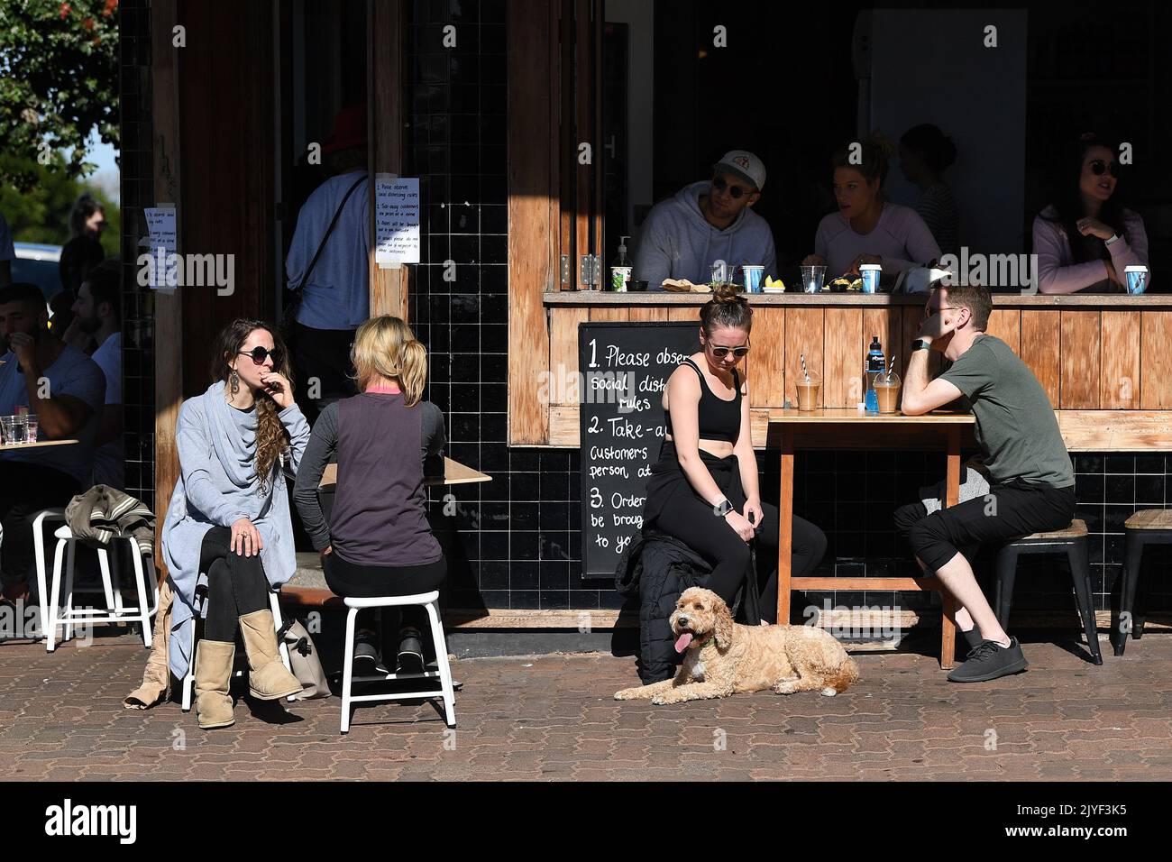 Diners are seen at a cafe in Bronte in Sydney, Sunday, July 19, 2020 ...