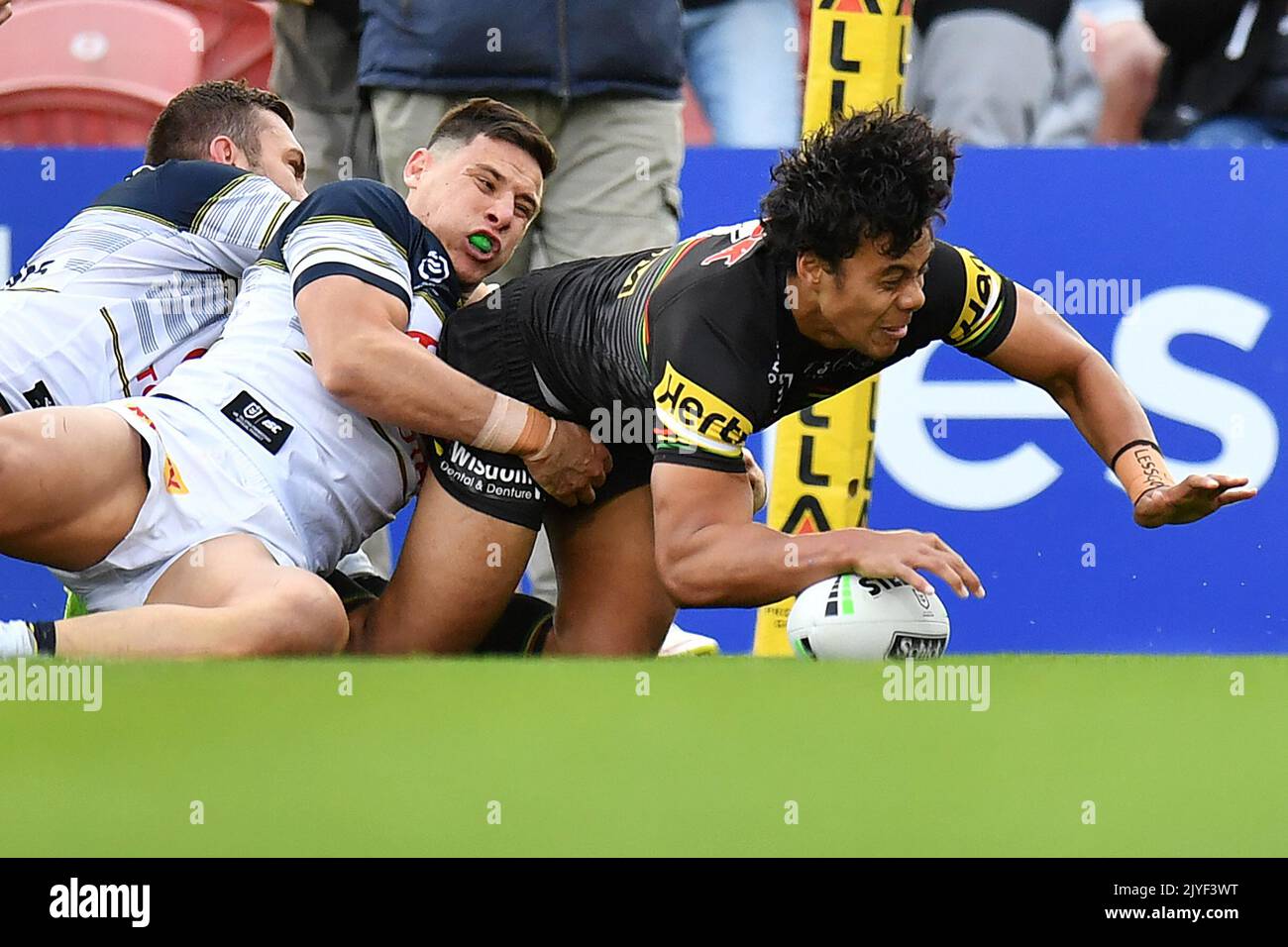 Jerome Luai of the Panthers scores the opening try during the Round 10 ...