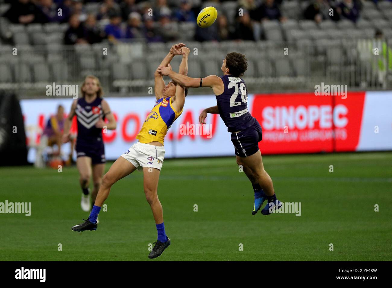 Jarrod Cameron of the Eagles and Lachie Schultz of the Dockers compete ...