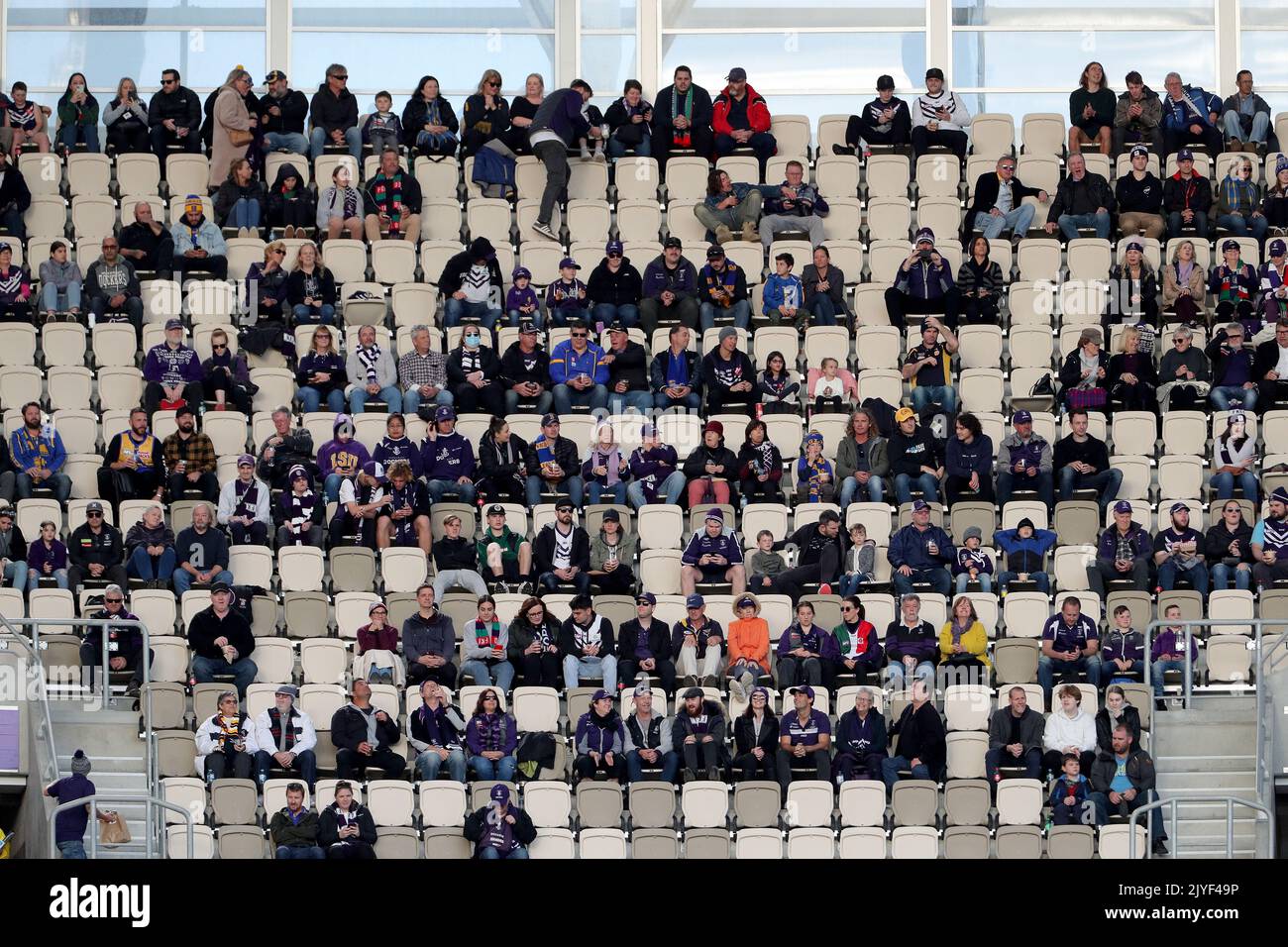 Socially distanced crowds are seen during the Round 7 AFL match between ...