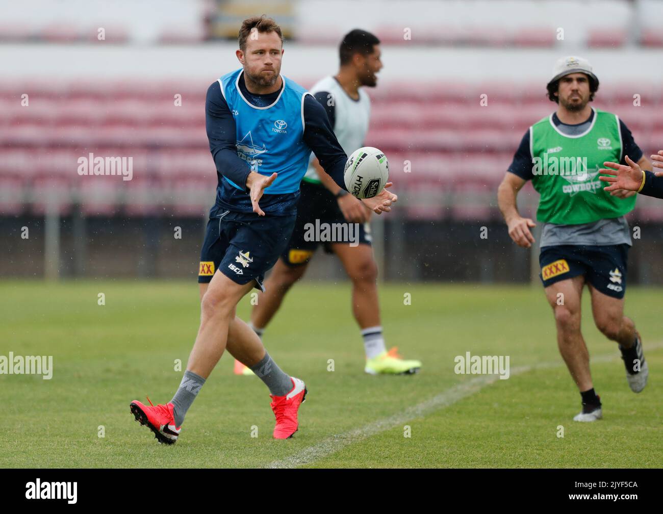 Gavin Cooper passes the ball during an NRL North Queensland Cowboys ...