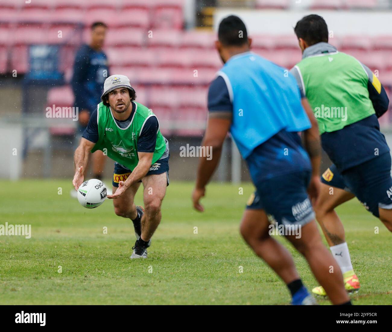Jake Granville passes the ball during an NRL North Queensland Cowboys ...