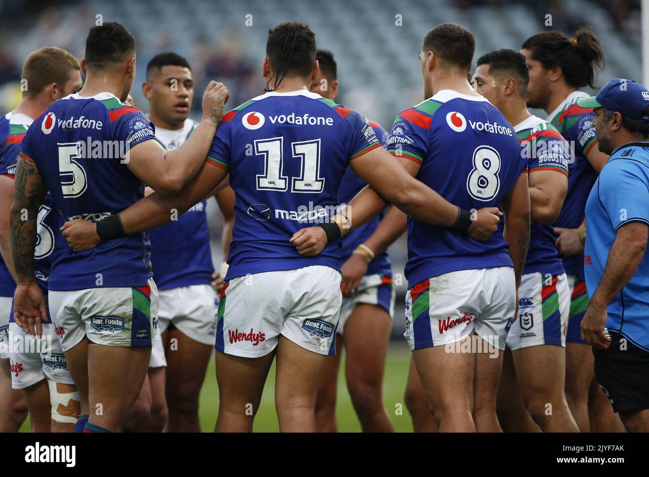 Warriors players form a huddle during the Round 11 NRL match between ...
