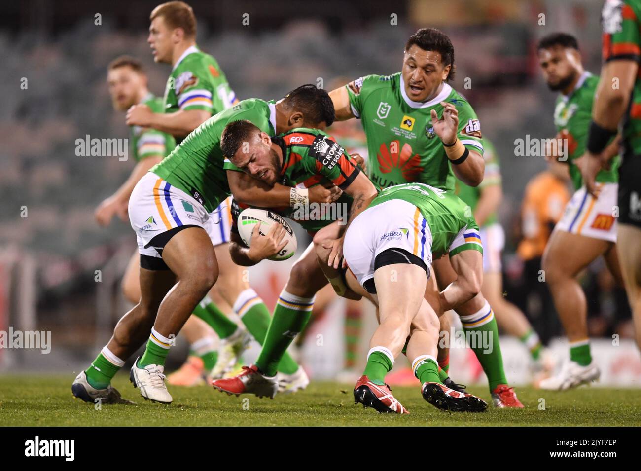 Corey Allan of the Rabbitohs is tackled during the Round 11 NRL match ...