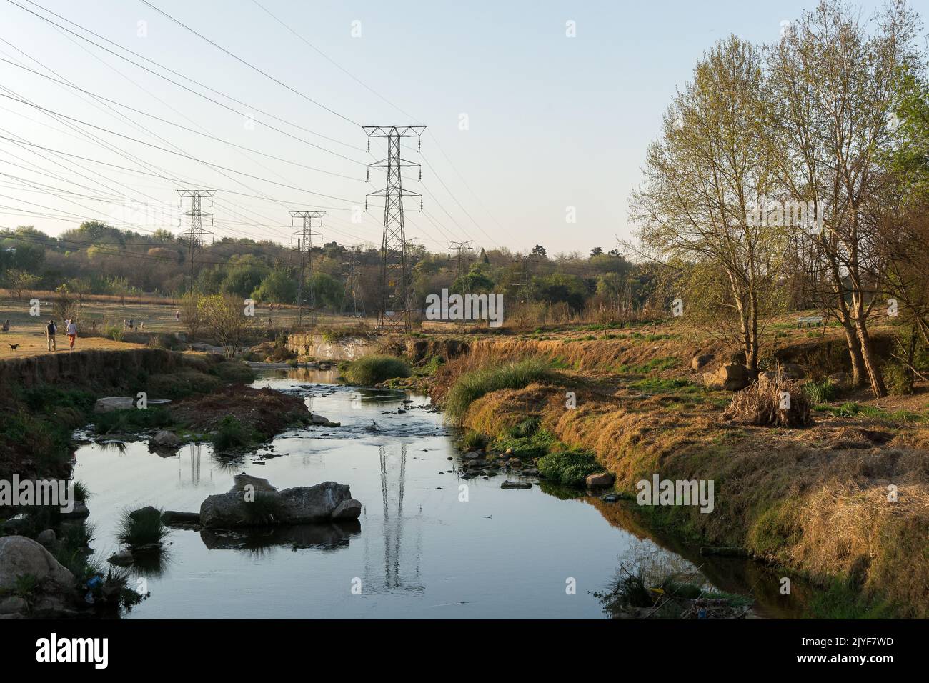 Electrical Transmission Overhead Powerlines crossing over an idyllic ...