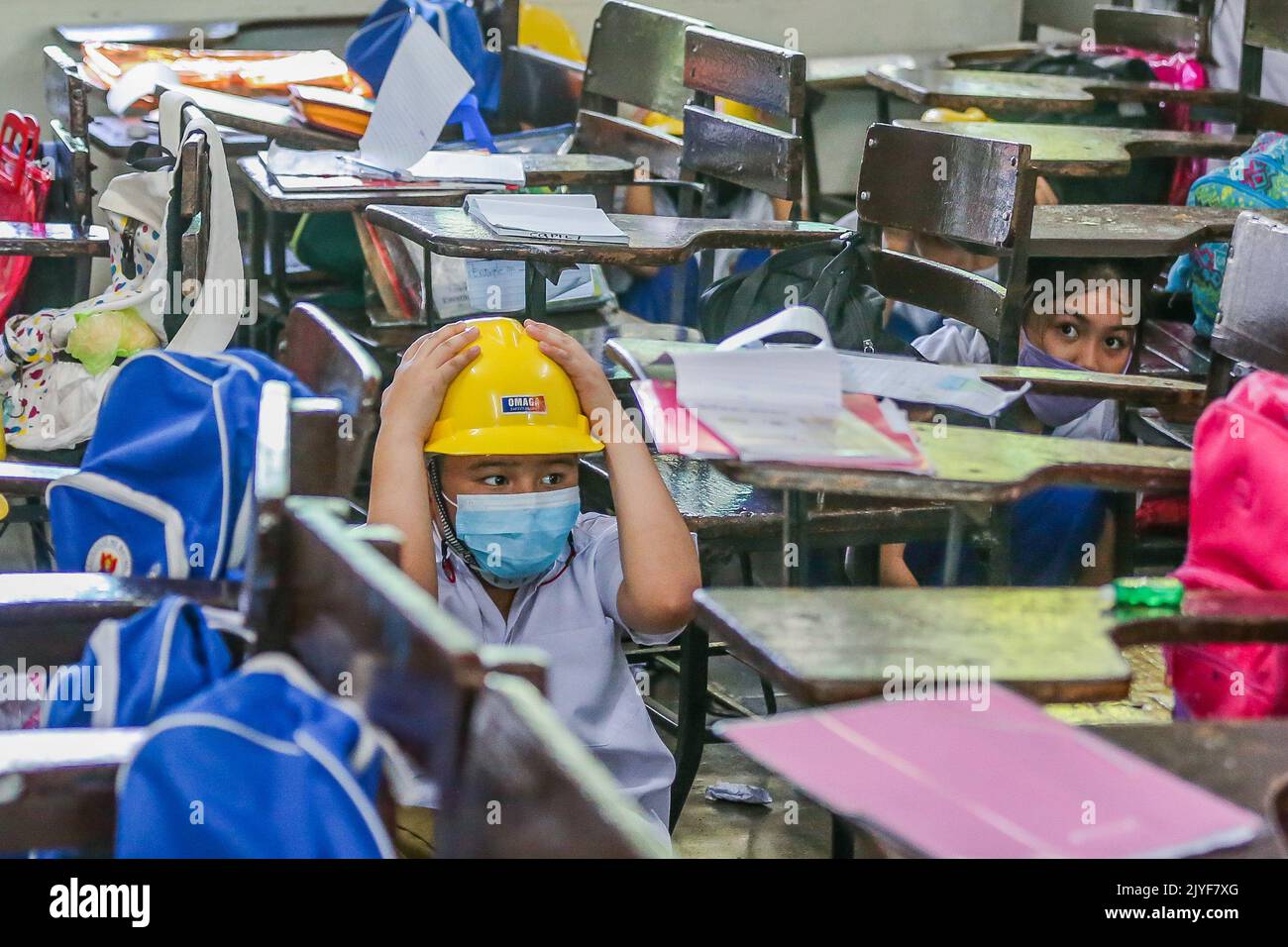 Manila, Philippines. 8th Sep, 2022. A student wearing a hard hat ...